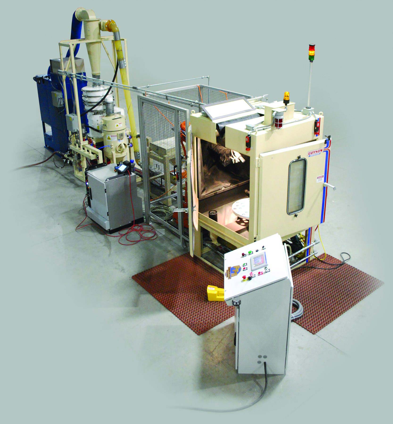 ROBOTIC BLAST MACHINE HAS TRANSFER CART - Guyson Corporation of USA